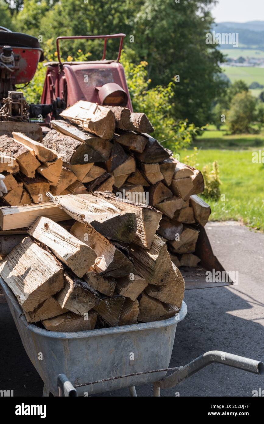 Stack Firewood Wheelbarrow High Resolution Stock Photography and Images ...