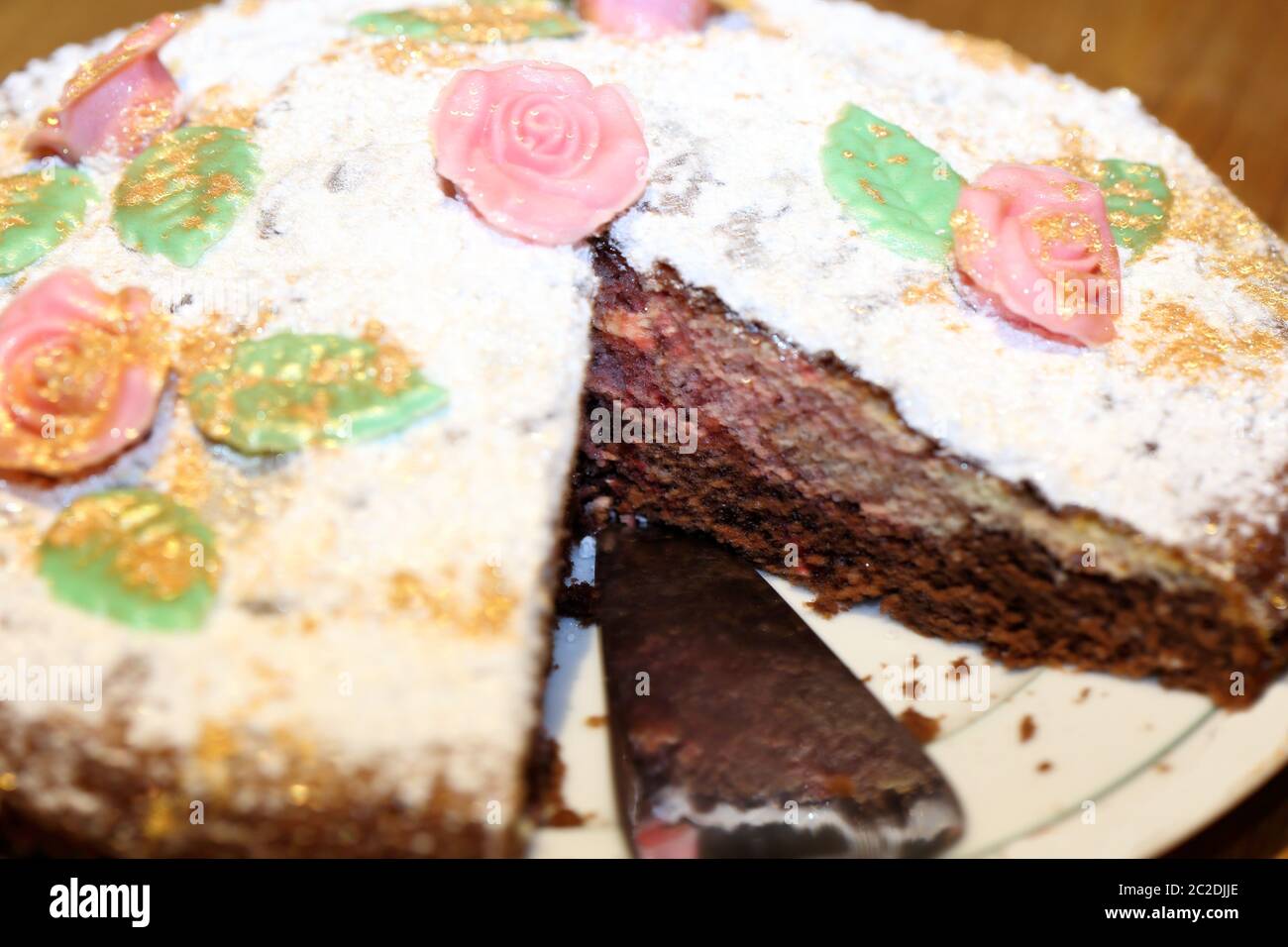birthday cake with sugar roses on a plate Stock Photo - Alamy