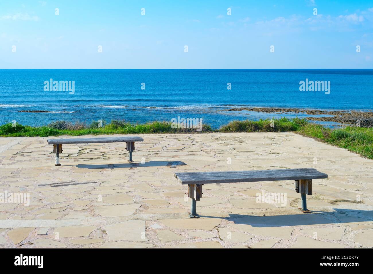 Empty benches by the sea. Paphos, Cyprus Stock Photo - Alamy