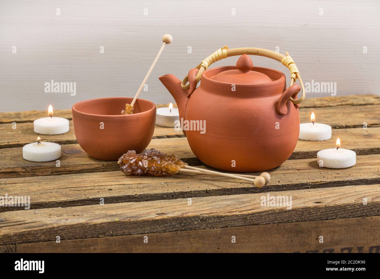 tea time still life in pure asian style with brown ceramic tea, cups ...