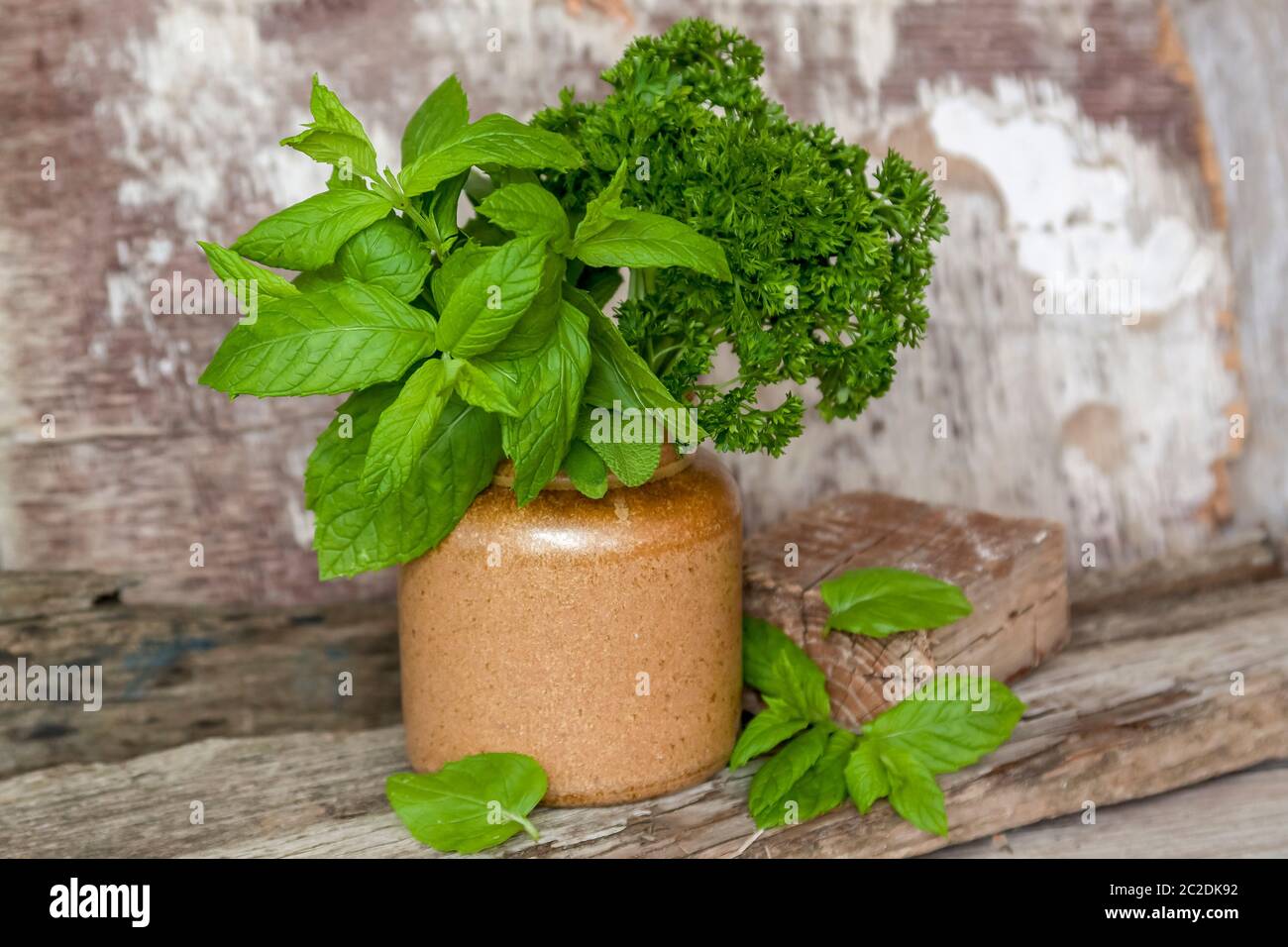 still life with basil and parsley across rustic wood Stock Photo - Alamy