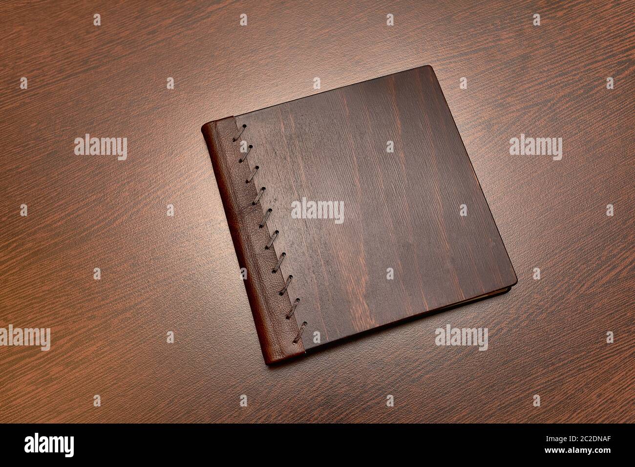 Note book with hard wooden cover Stock Photo - Alamy