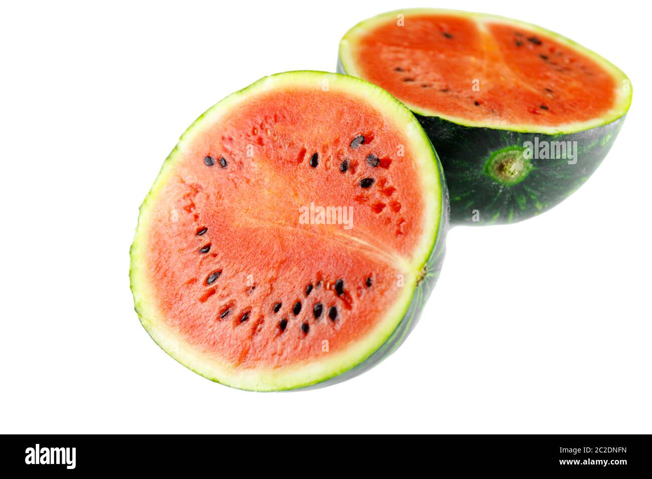 sliced half watermelon isolated on white background Stock Photo - Alamy