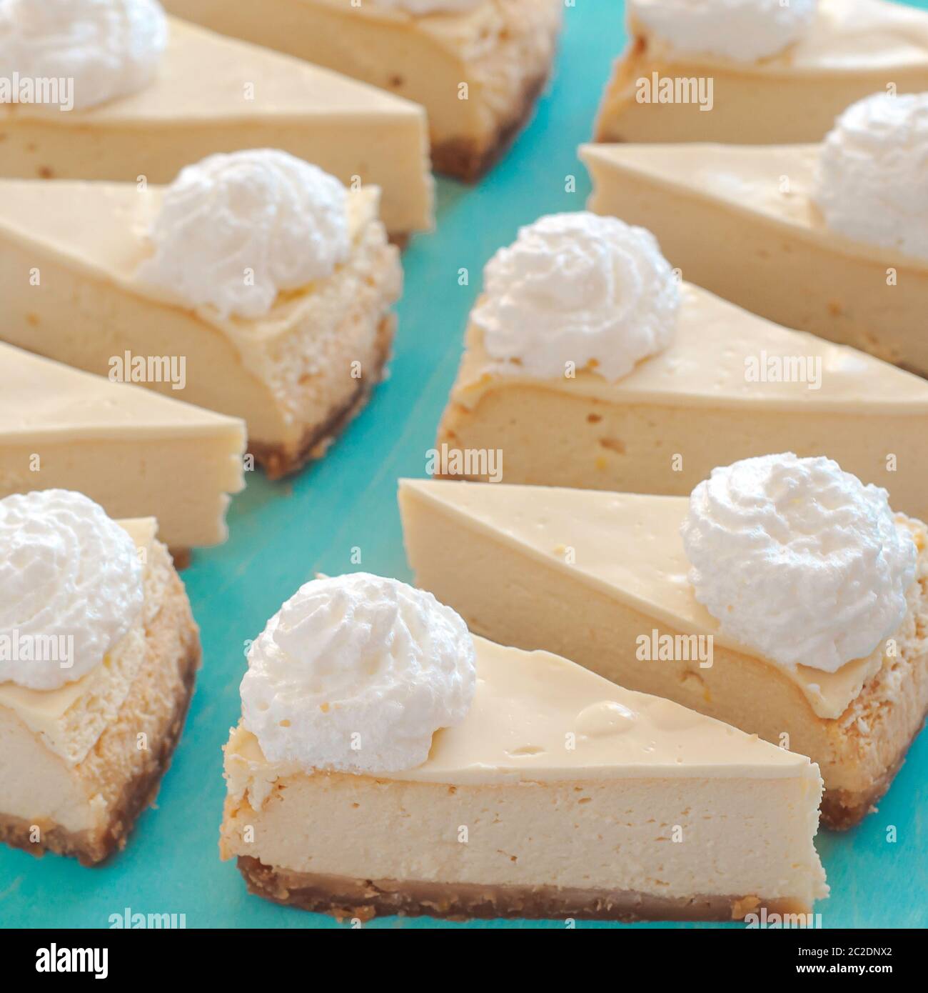 cheesecake pattern, servings of cheesecake on a blue background Stock ...