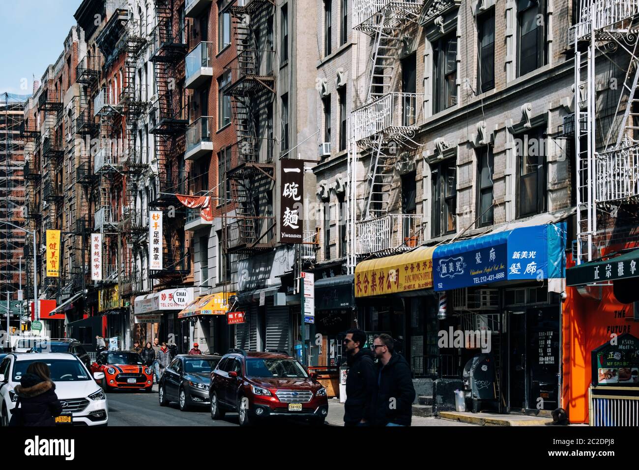 Mott street view in china town with lots of chinese signs in Lower ...
