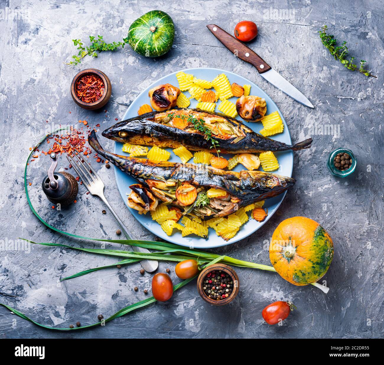 Baked mackerel in leek leaves.Fish with pumpkin filling.Seafood Stock ...