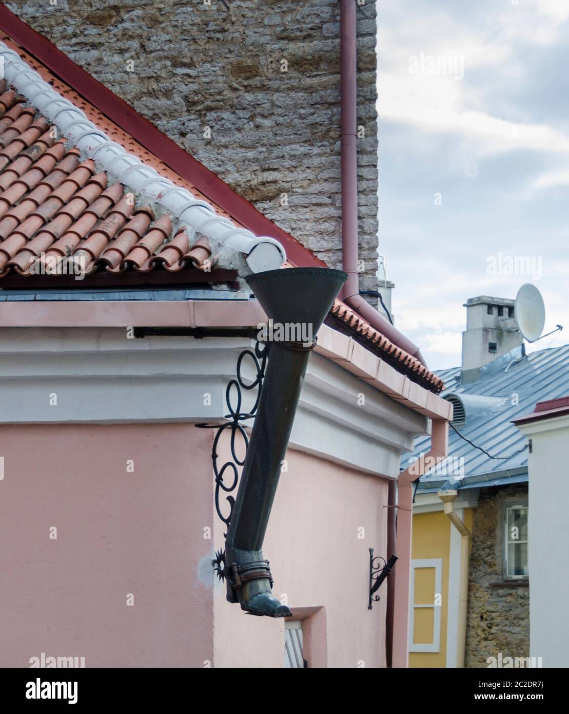 Ornate rainwater downpipe on the corner of a building Stock Photo - Alamy