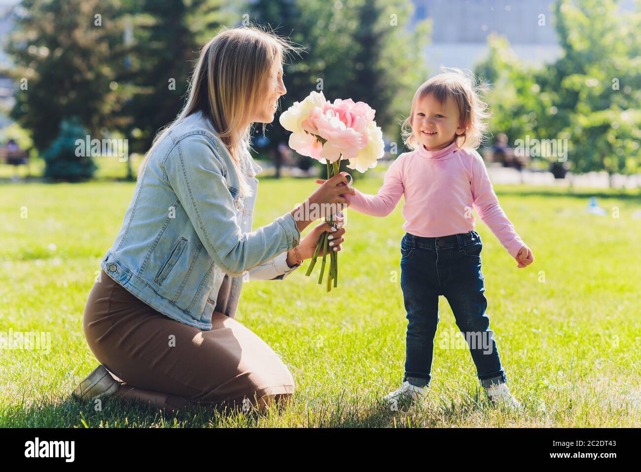 Happy mother's day Daughter is congratulating mom and giving her ...