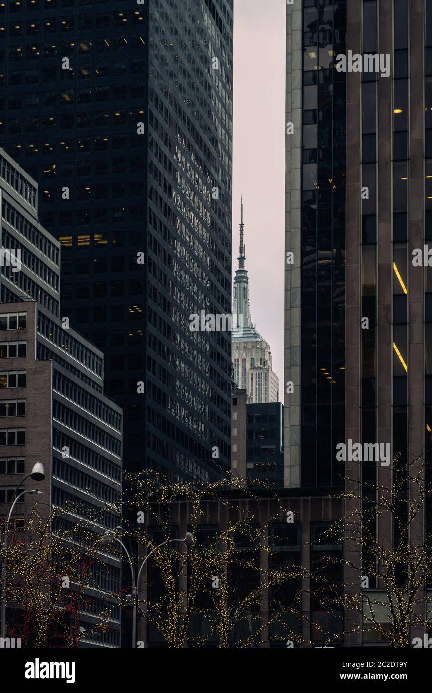 Perspective view to facade fragment of the modern buildings and Empire ...