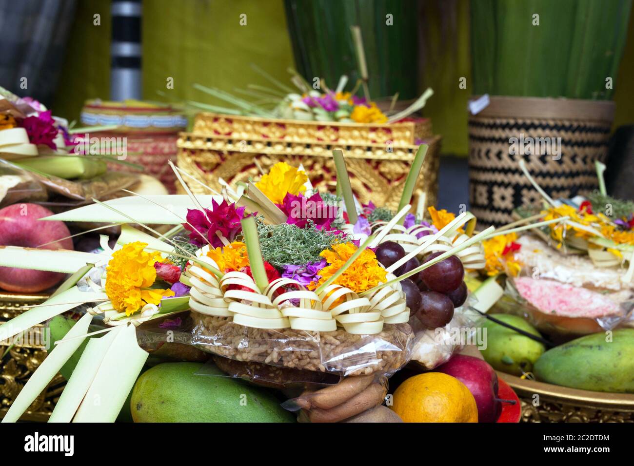 Traditional offerings to gods in Indonesia with flowers, fruits and ...
