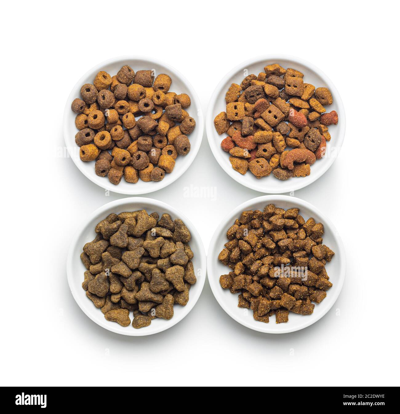 Dry kibble pet food in bowl. Kibble for dog or cat isolated on white ...