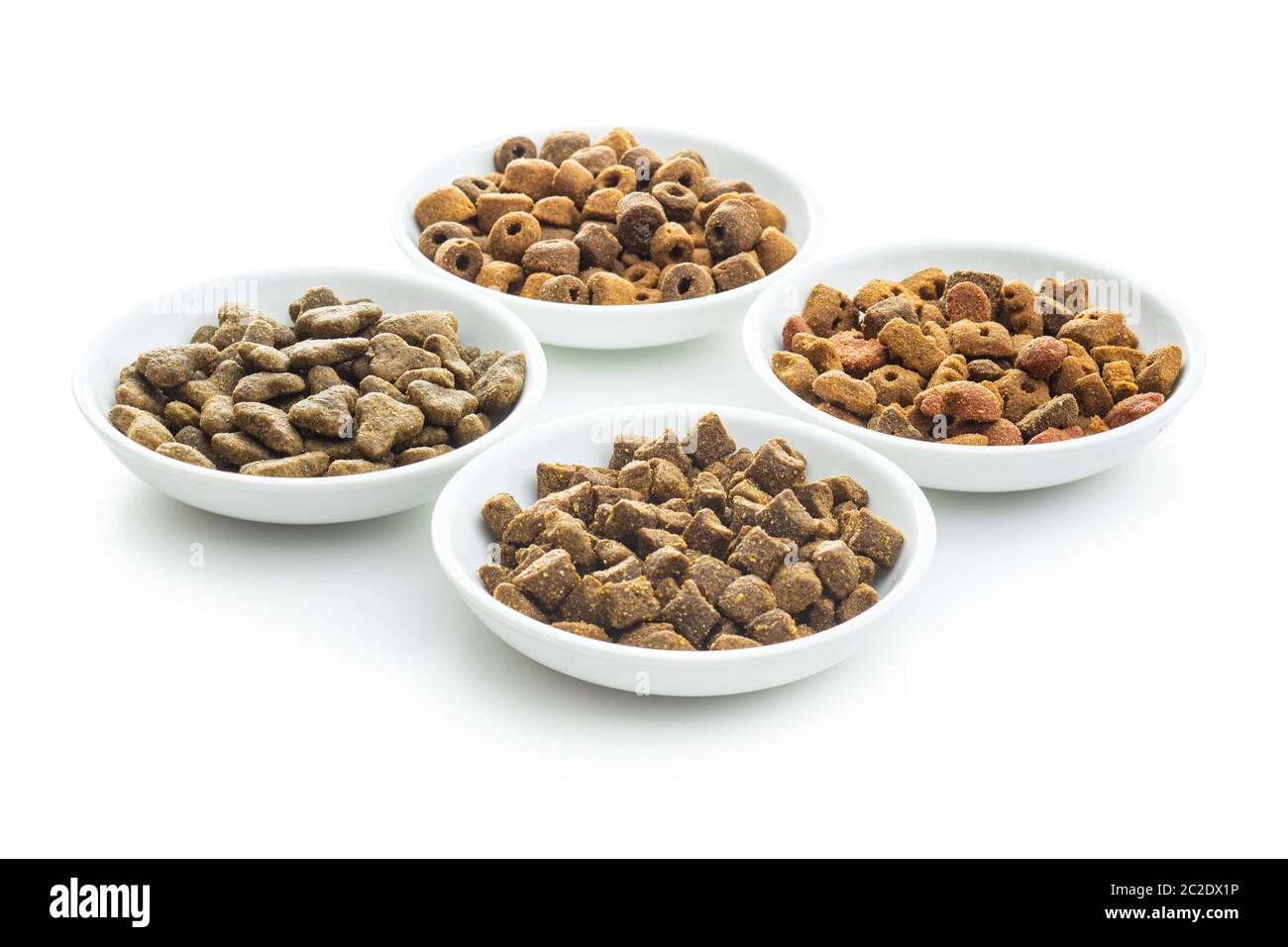Dry kibble pet food in bowl. Kibble for dog or cat isolated on white ...