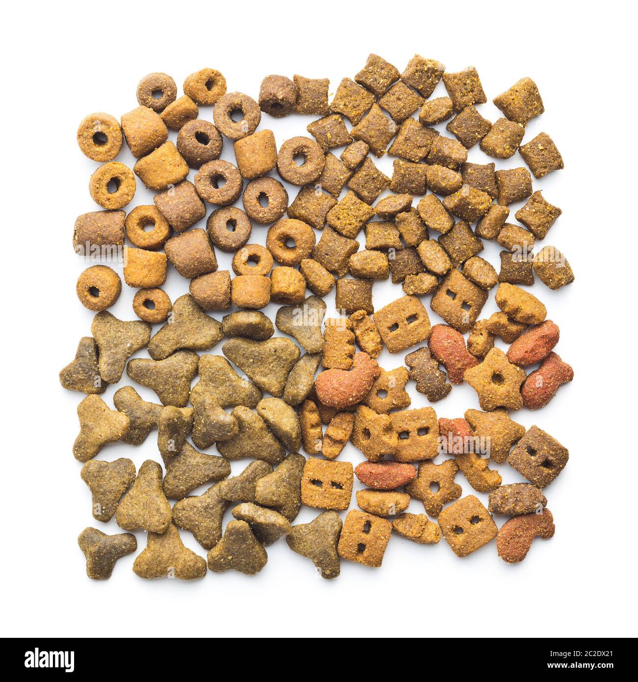 Dry kibble pet food. Kibble for dog or cat isolated on white background ...