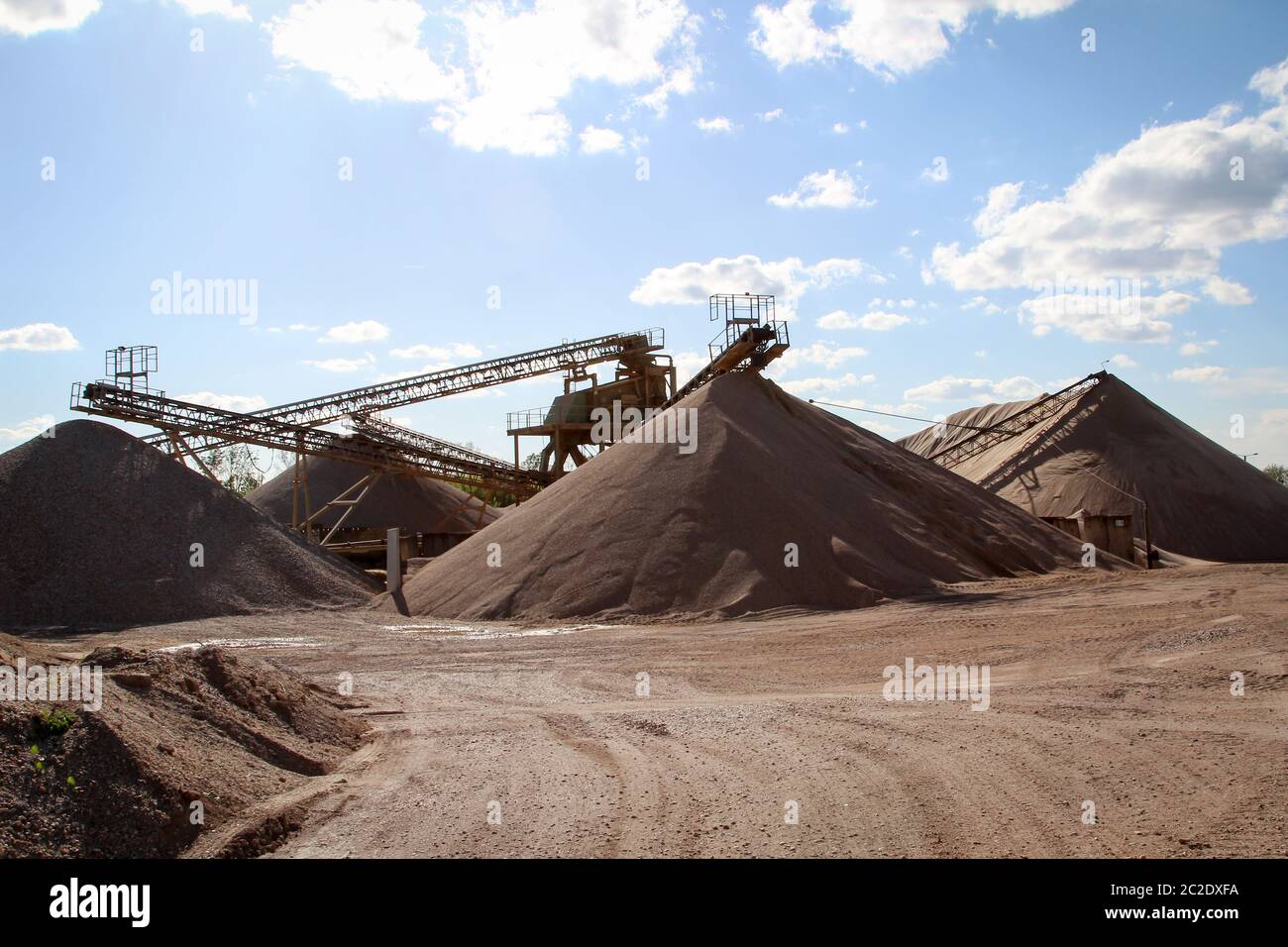 A string of transport belting in a gravel pit for transporting gravel ...