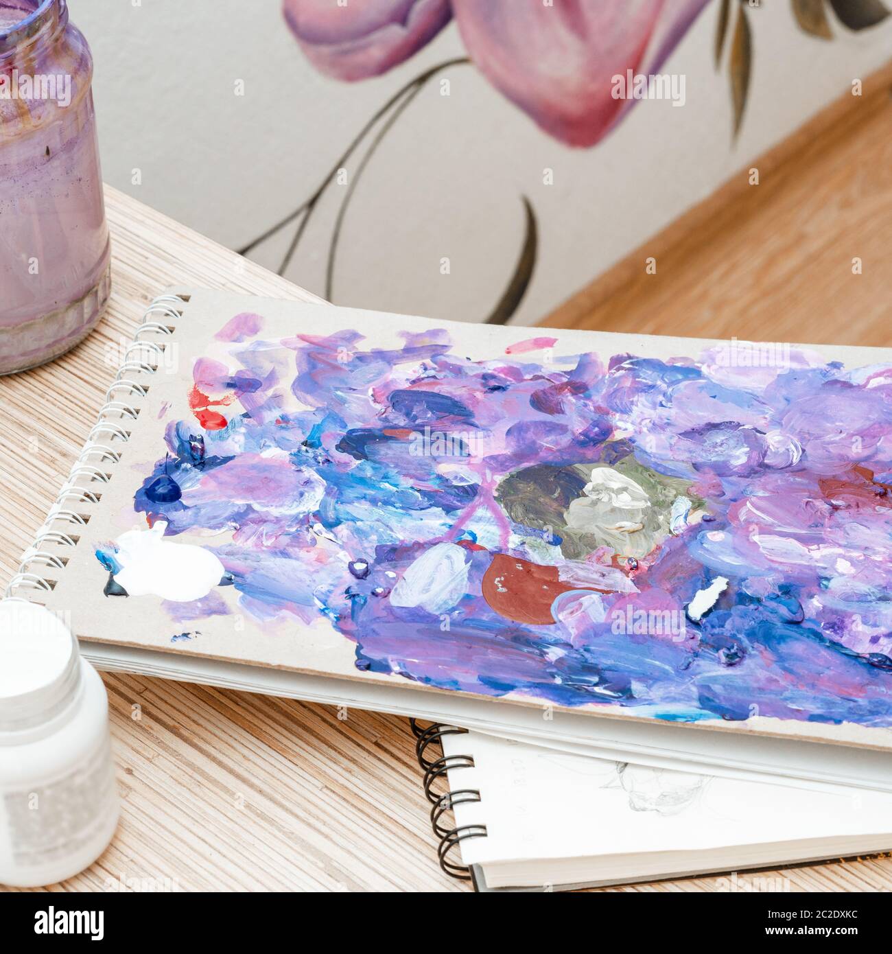 Tools of the artist. Palette, paints, brushes during use. Creativity ...