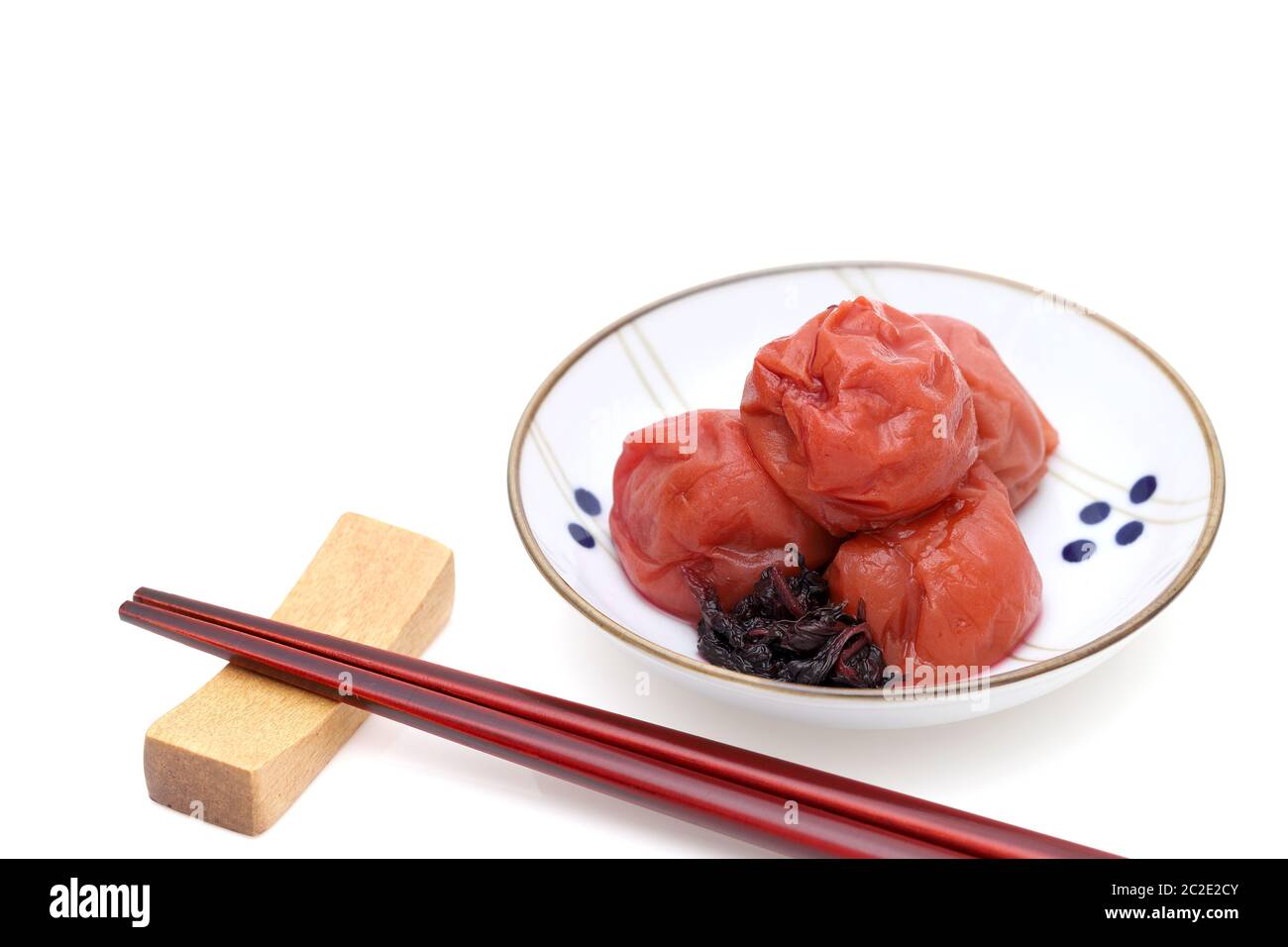 Japanese food, salted Umeboshi on white background Stock Photo - Alamy