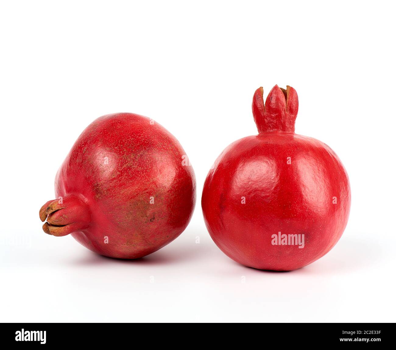 Two whole pomegranates studio hi-res stock photography and images - Alamy