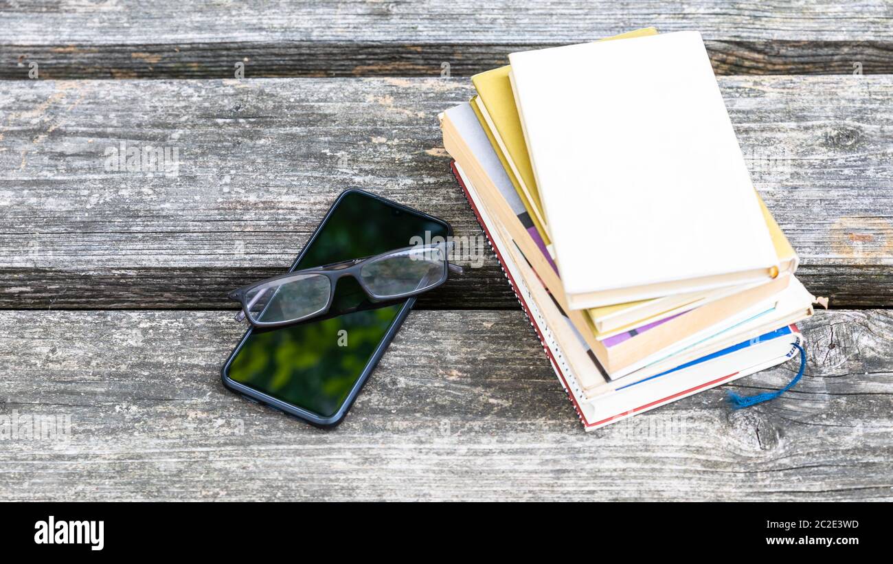 books and reading glasses Stock Photo - Alamy