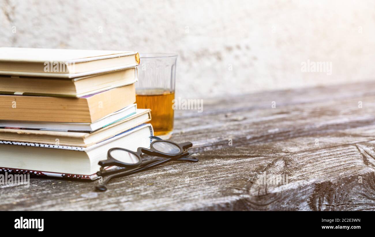 books and reading glasses Stock Photo - Alamy