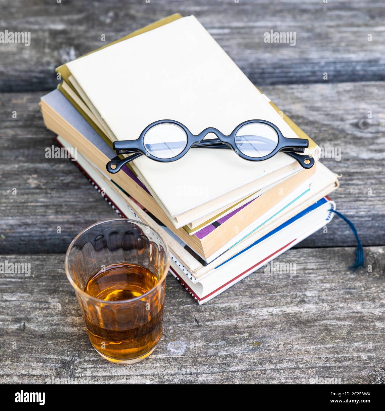 books and reading glasses Stock Photo - Alamy