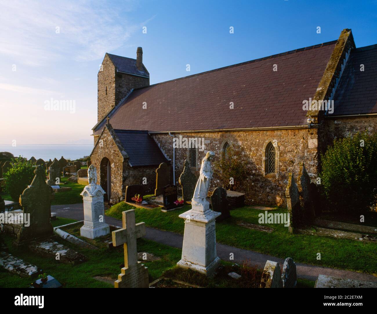 View NW at sunset of St Mary the Virgin's Church, Rhossili, Gower ...