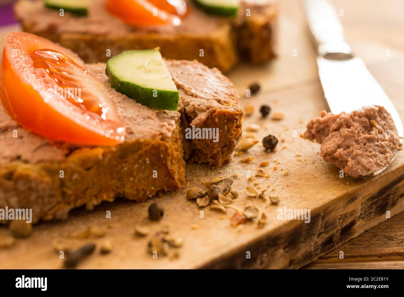 Delicious sandwiches made from liver pate on wooden background Stock ...