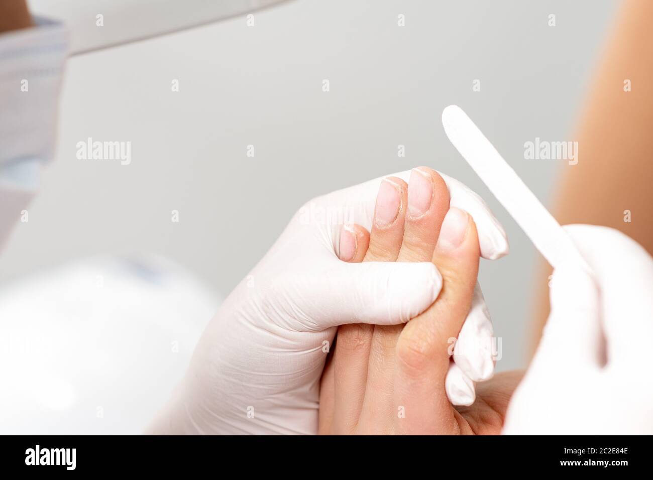 Doing manicure hand young woman hi-res stock photography and images - Alamy