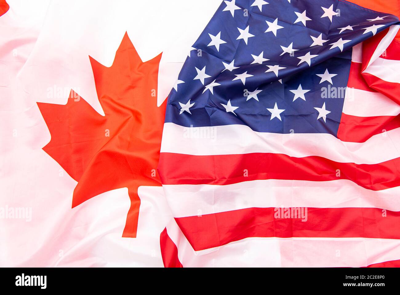 Natural fabric Canada and USA flags as background, Canadian and ...