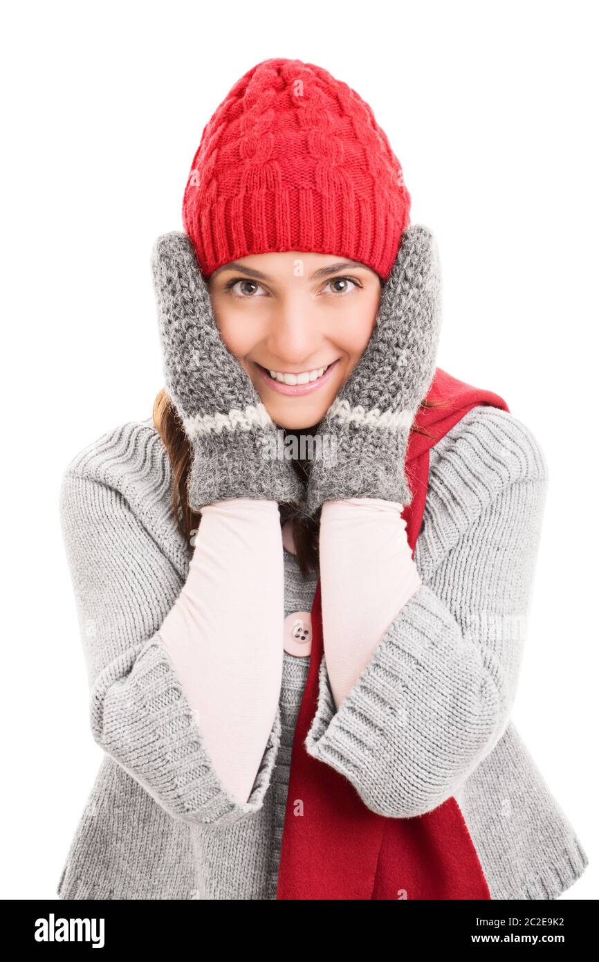 Portrait of a beautiful smiling young woman with warm winter clothes ...