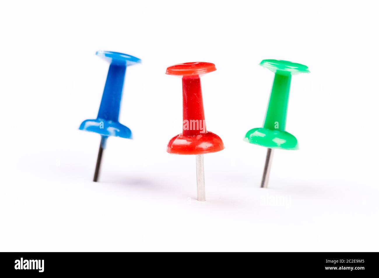set of colorful push pins isolated on white background Stock Photo - Alamy