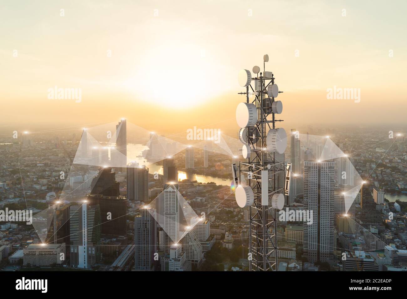 Telecommunication tower with 5G cellular network antenna on city background Stock Photo - Alamy