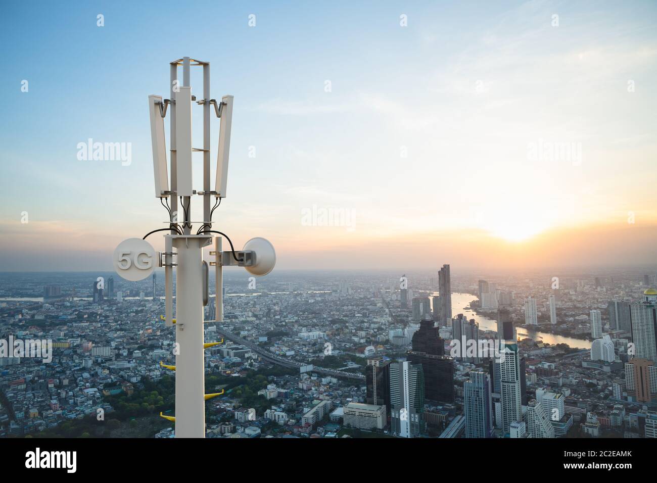 Telecommunication tower with 5G cellular network antenna on city ...