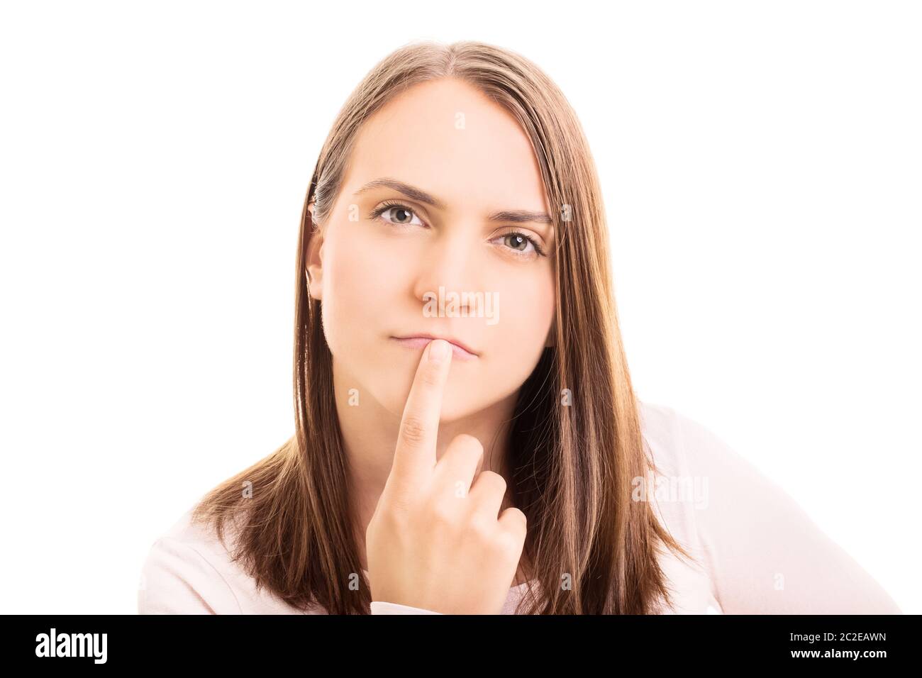 Close up shot of a beautiful young girl thinking of something, isolated ...