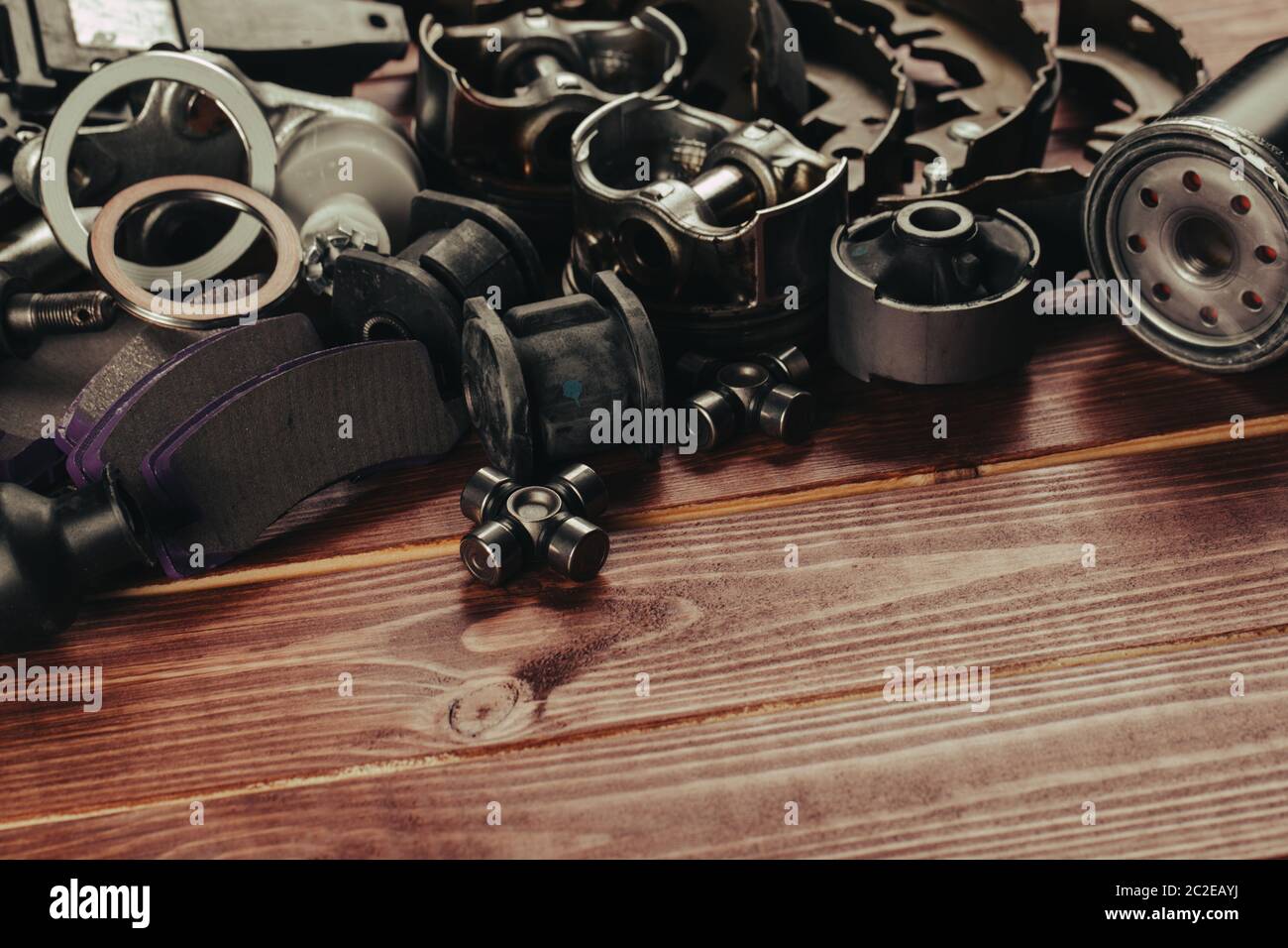Various car parts on dark woooden background Stock Photo - Alamy