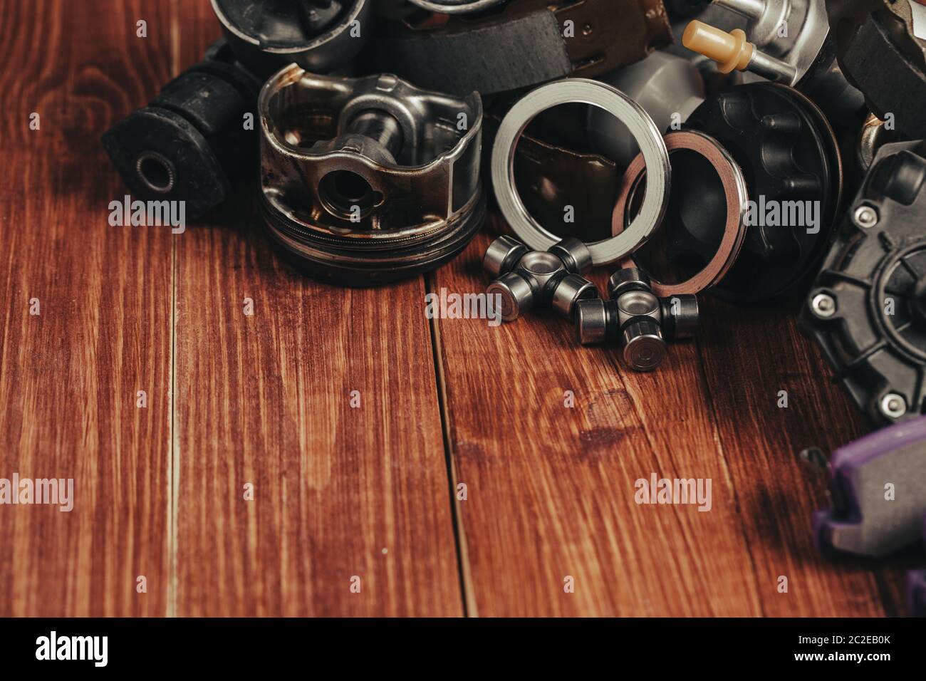 Various car parts on dark woooden background Stock Photo - Alamy