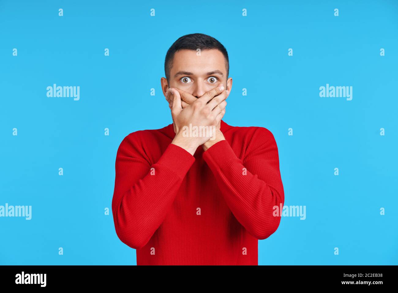 Hands over mouth hi-res stock photography and images - Alamy