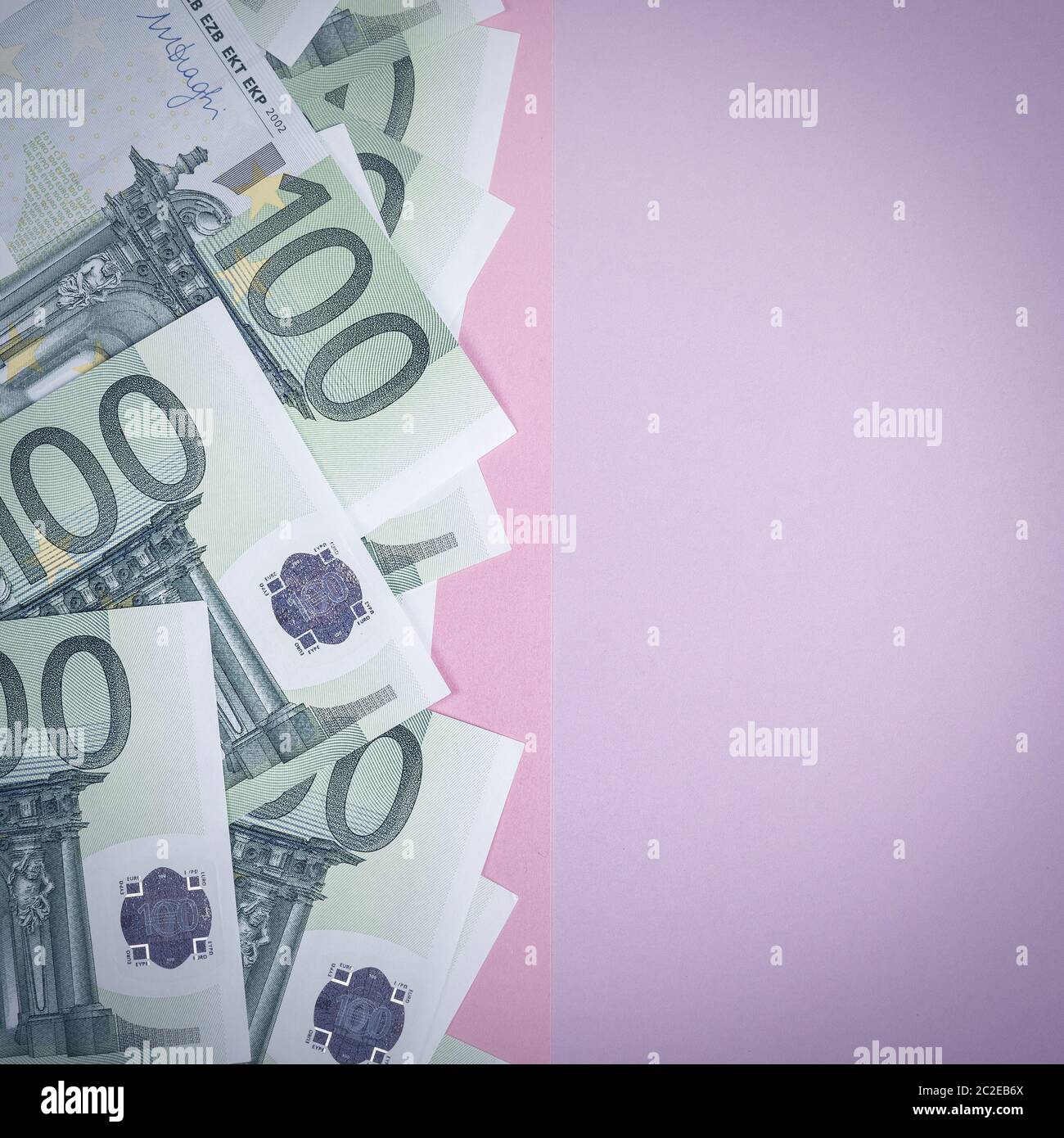 Euro cash on a lilac, purple and pink background. Euro Money Banknotes ...
