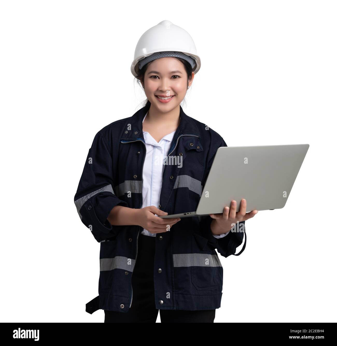 Young asian female engineer with laptop computer isolated on white ...