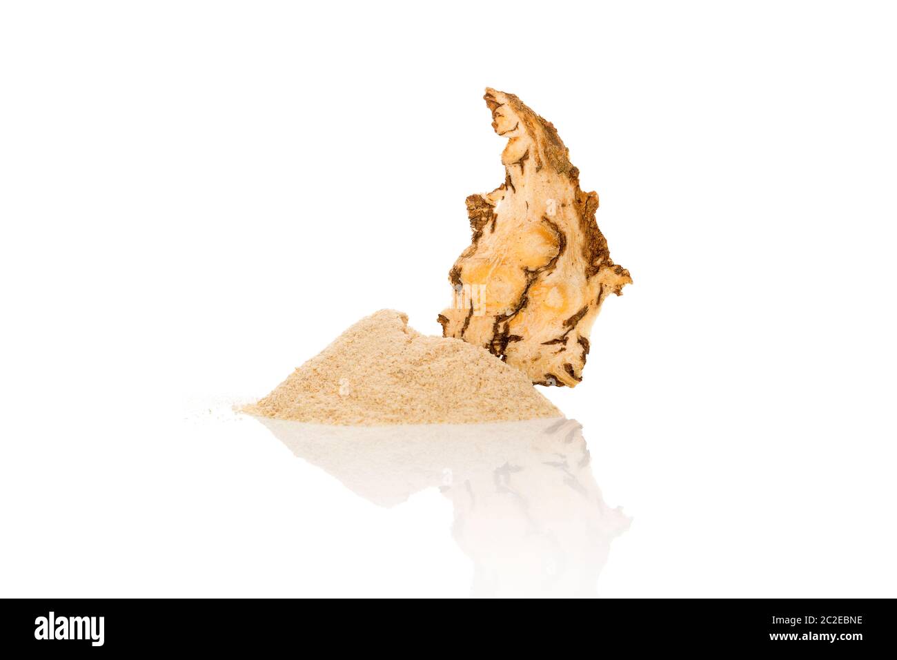 Angelica root slices and powder isolated on white background. Medicinal ...