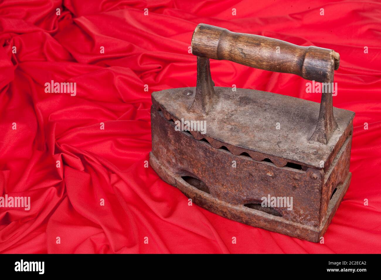 Ancient Iron And Red Fabric Stock Photo - Alamy