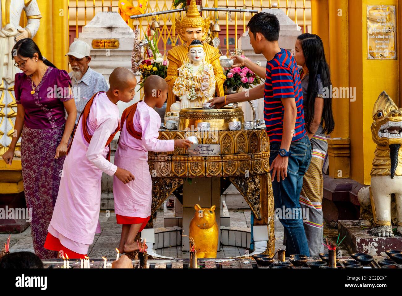 Burmese People Bathing The Buddha At The Shwedagon Pagoda, Yangon ...
