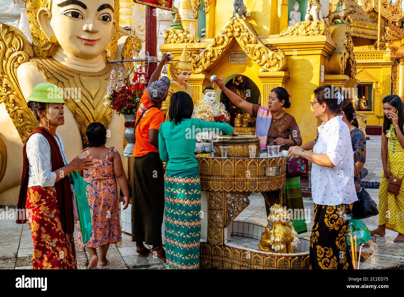 Burmese People Bathing The Buddha At The Shwedagon Pagoda, Yangon ...