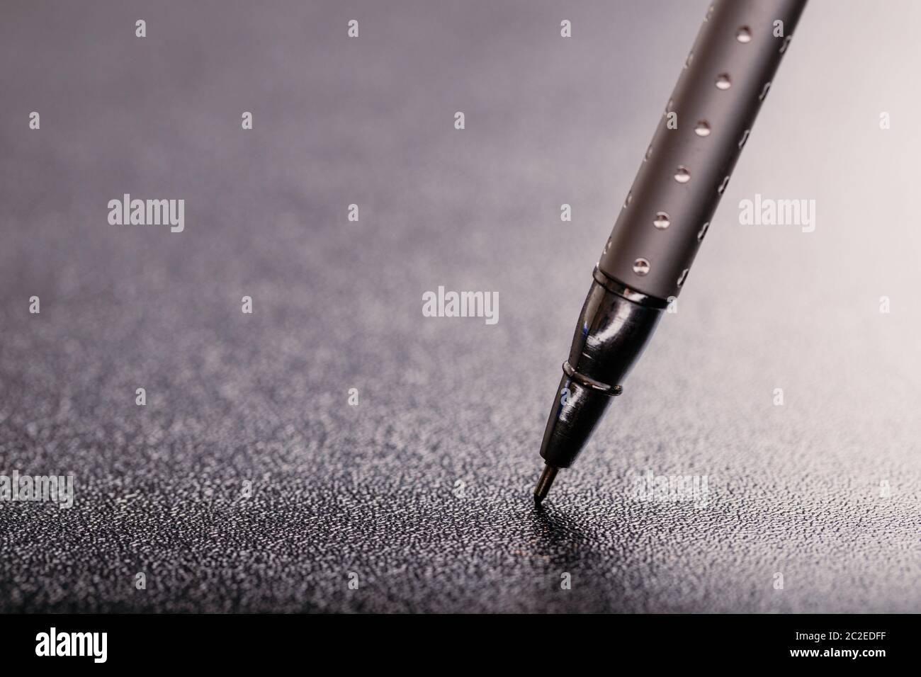 automatic plastic ballpoint pen with clipping path on black background ...