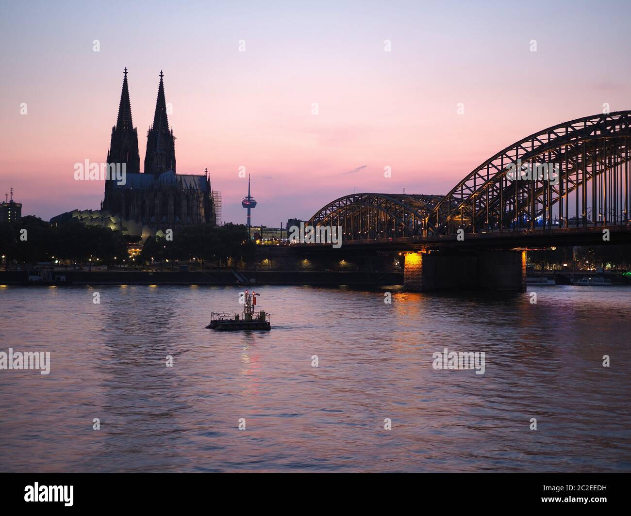 View of the city in Koeln, Germany From The River At Night Stock Photo ...