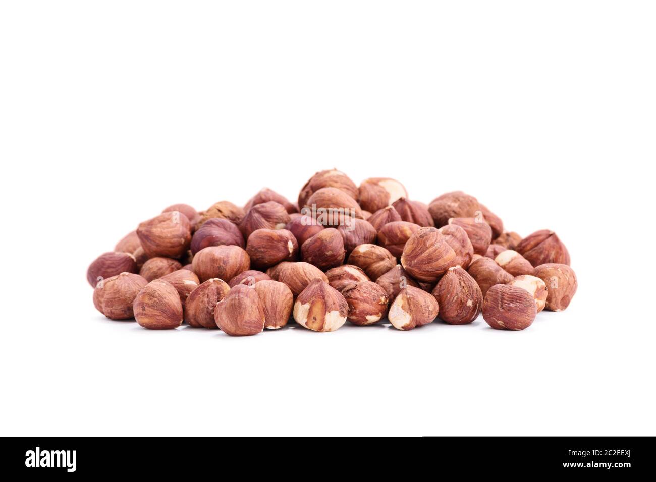 Close up shot of heap of hazelnuts, isolated on white background Stock ...
