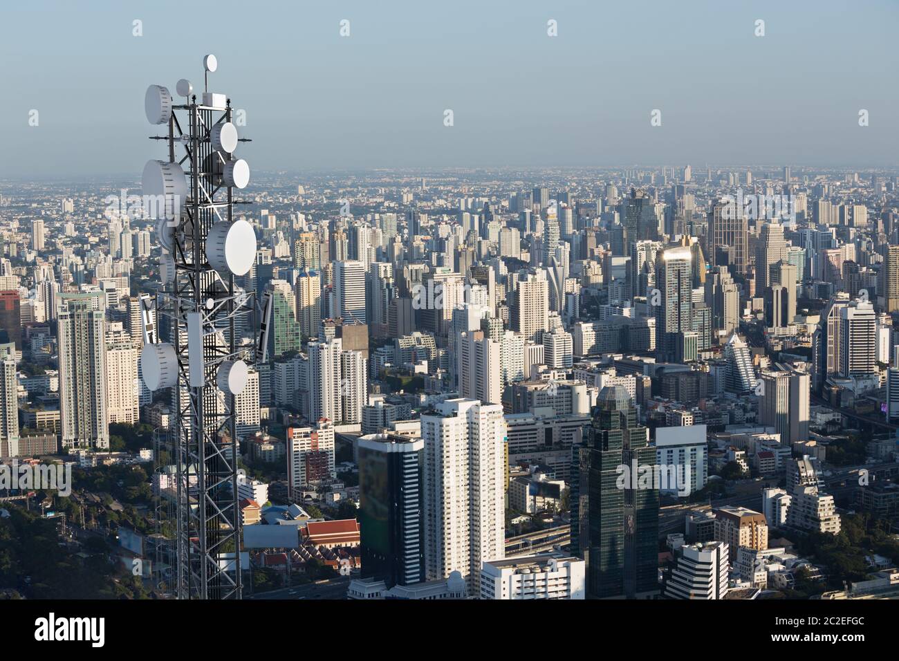 Telecommunication tower with 5G cellular network antenna on city ...