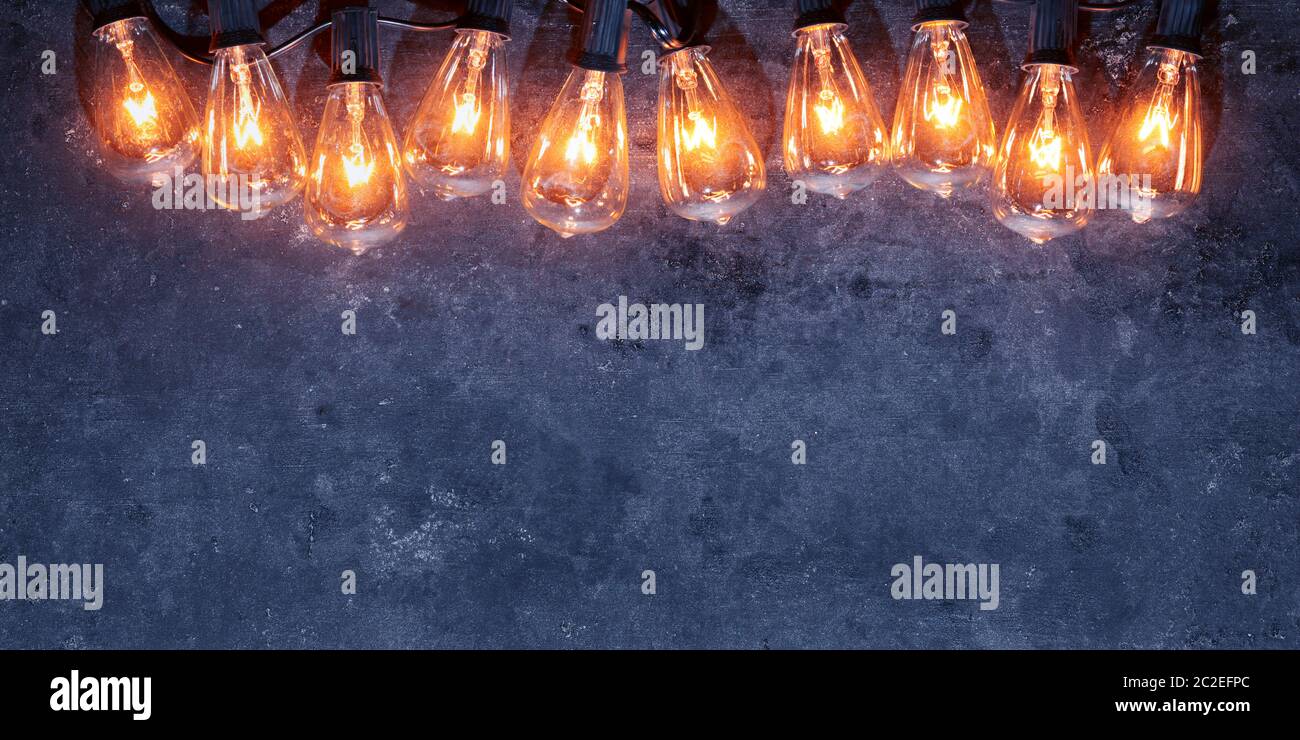 Row glowing string lights hi-res stock photography and images - Alamy