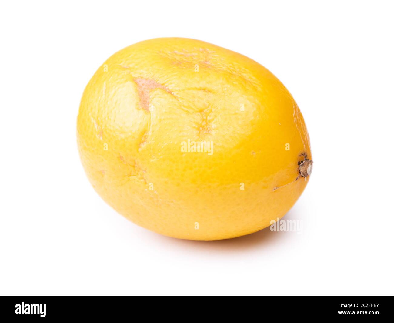 Spoiled lemon isolated on white background Stock Photo - Alamy