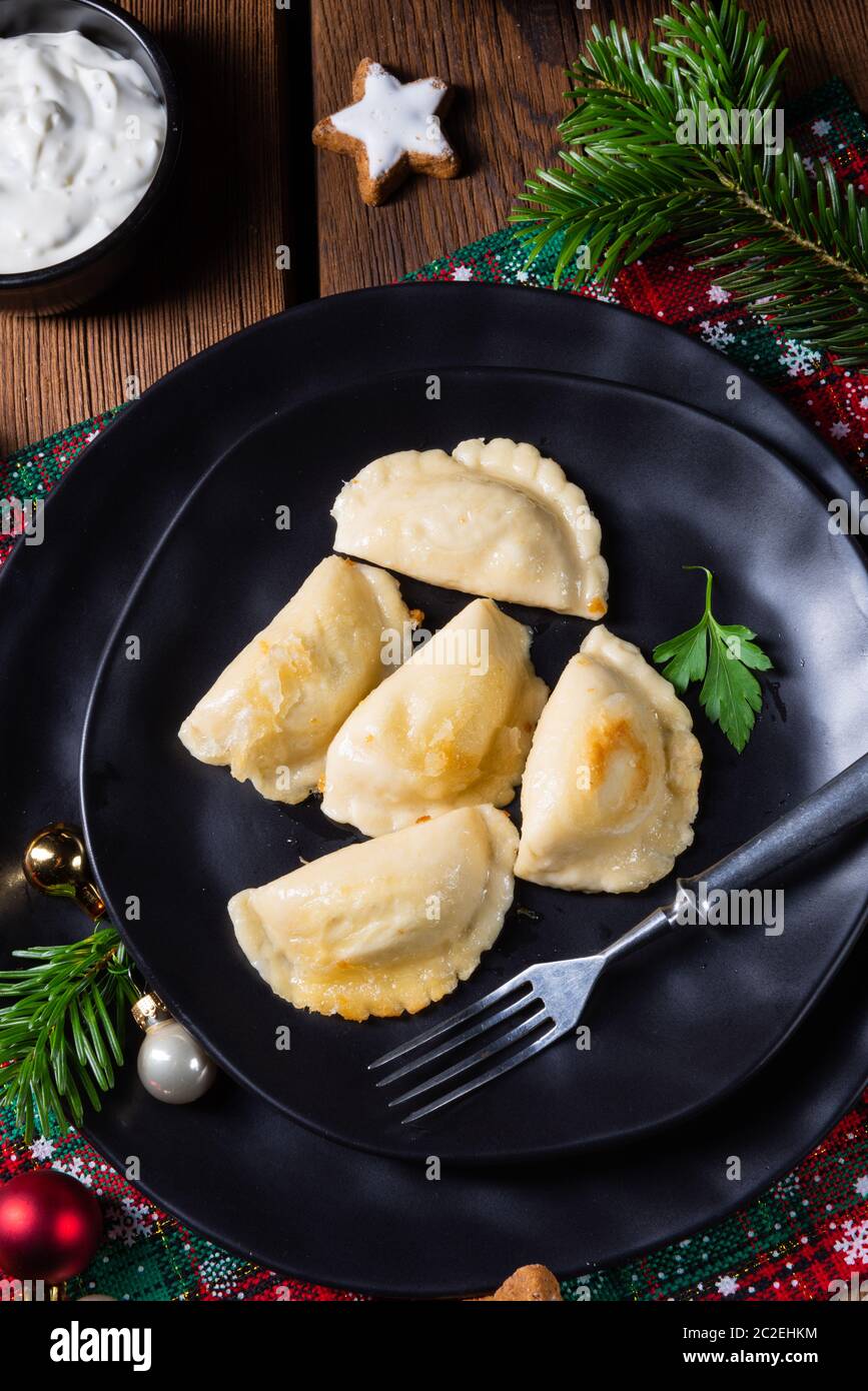 Polish Christmas pierogi with sauerkraut and mushrooms Stock Photo - Alamy