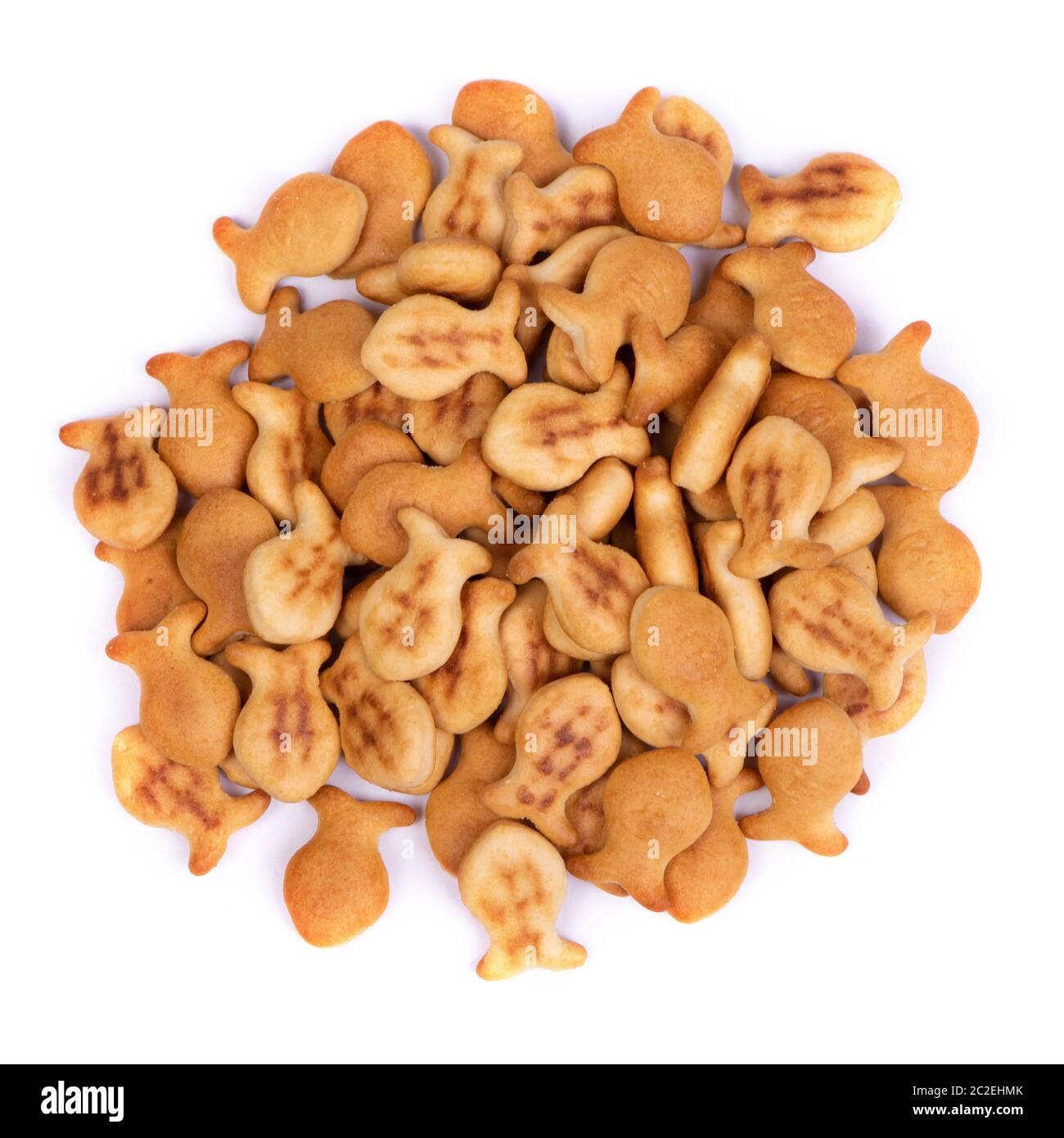 Pile of fish-shaped cookies, salt crackers isolated on white background ...